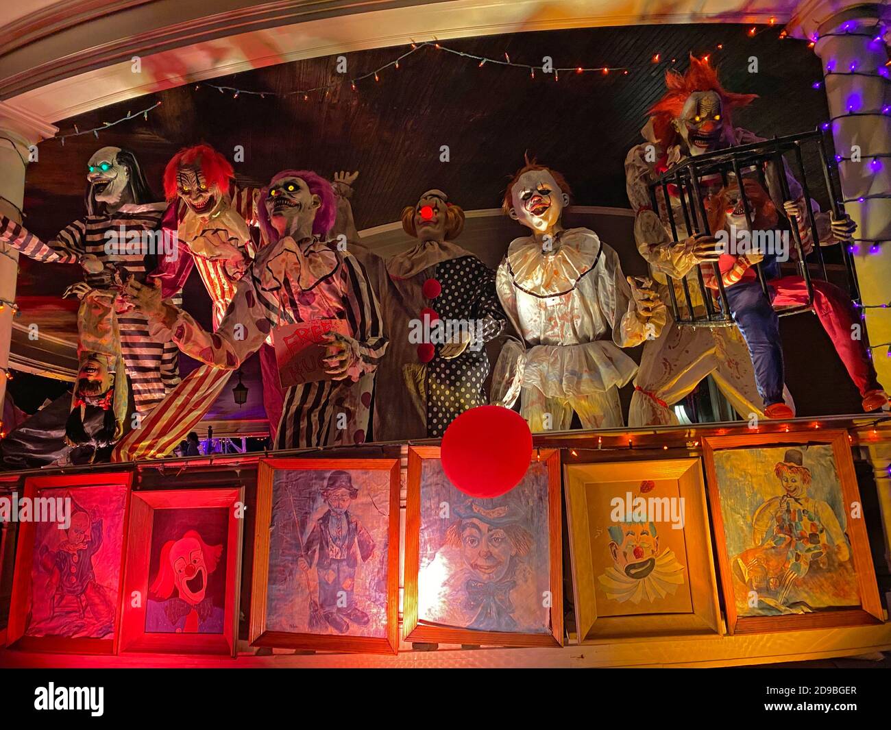 Scary Halloween installation on the porch of a large victorian house in ...
