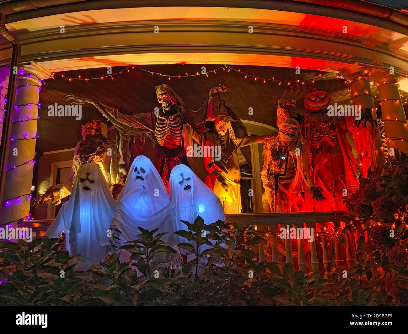 Scary Halloween installation on the porch of a large victorian house in ...