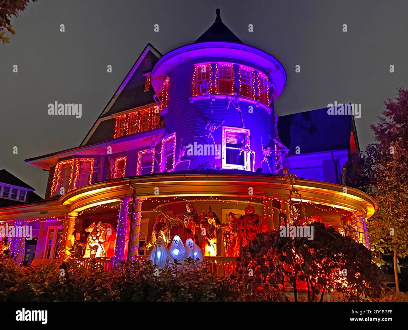 Scary Halloween installation on the porch of a large victorian house in ...