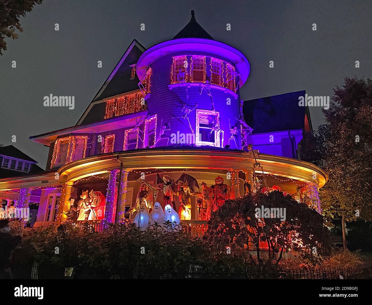 Scary Halloween installation on the porch of a large victorian house in ...