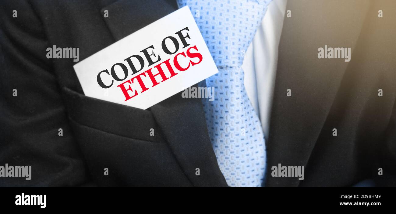 Code of ethics words on card in Businessman upper suit pocket. Business ...