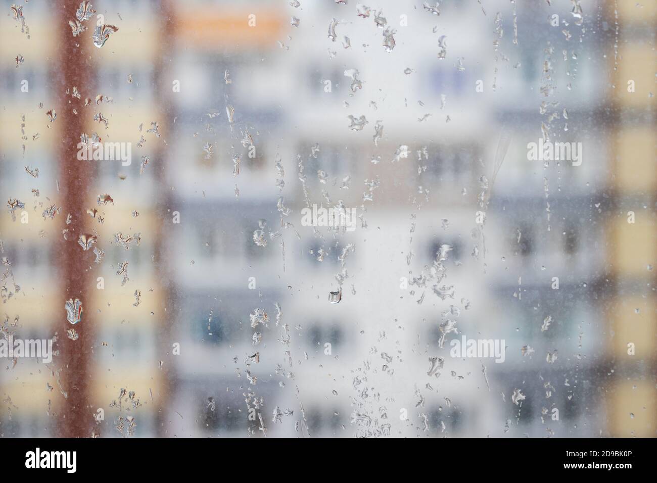 View through a rainy window on a blurred house. Bad rainy weather Stock ...