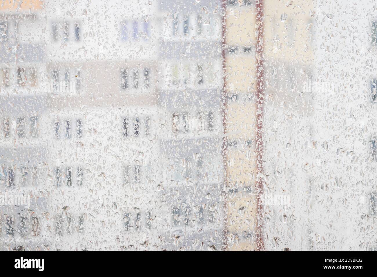 View through a rainy window on a blurred house. Bad rainy weather Stock ...