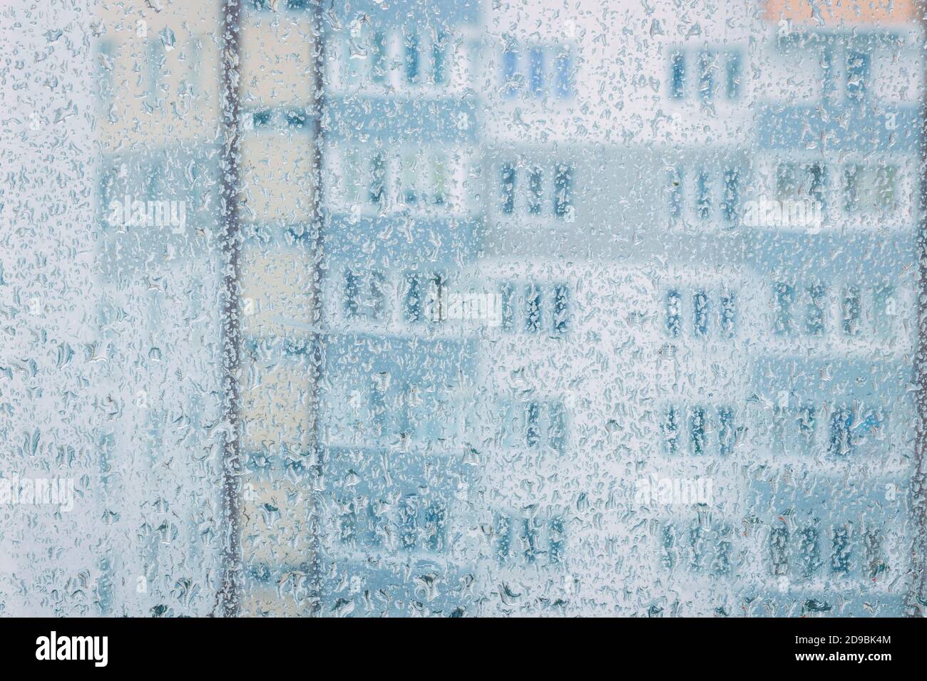 View through a rainy window on a blurred house. Bad rainy weather Stock ...