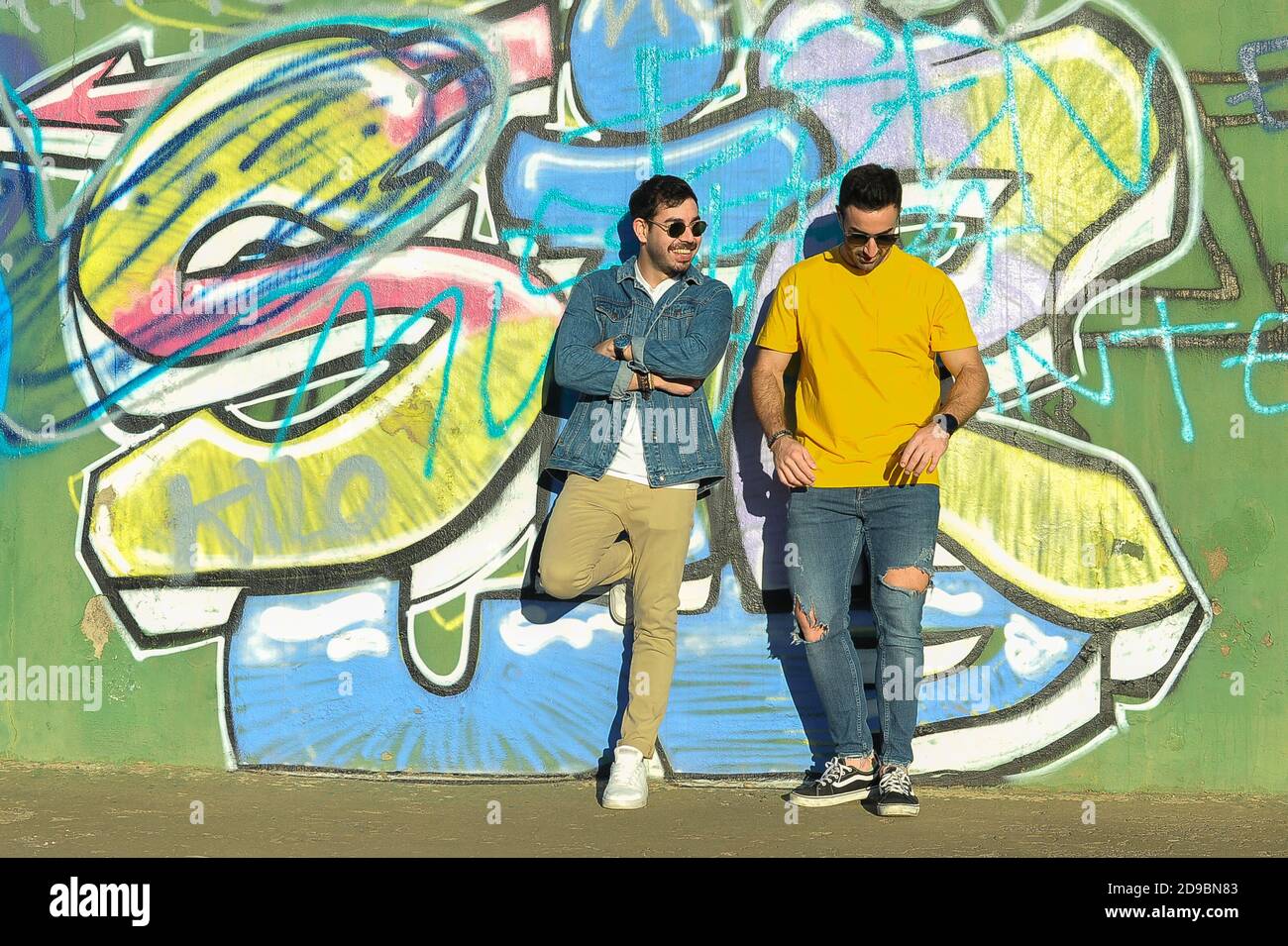 Two men laugh together hi-res stock photography and images - Alamy