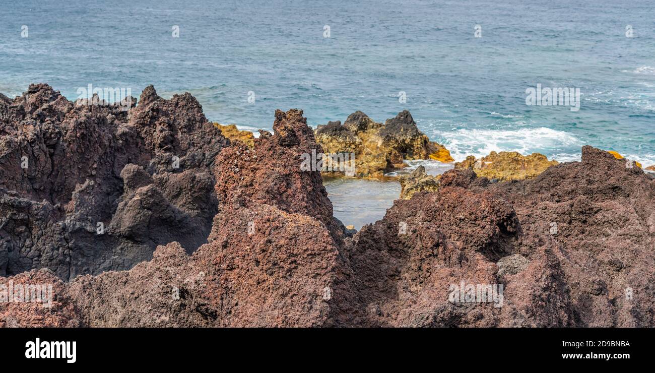 Natural volcanic rocks near Ponta da Ferraria, the place where hot ...