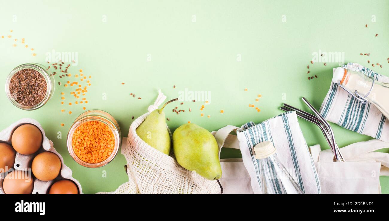 Green zero waste background with accessories Stock Photo - Alamy