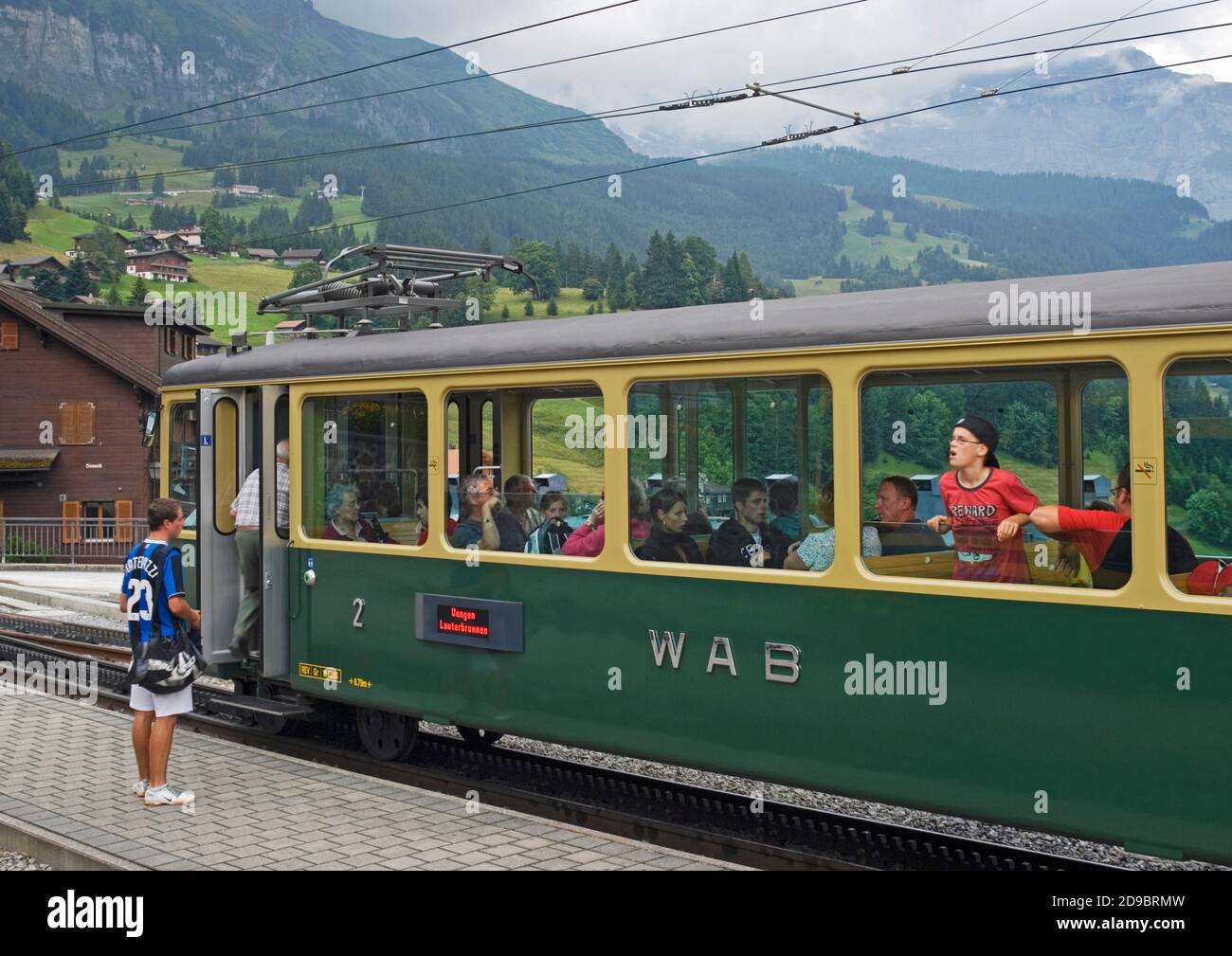 the Jungfraubahn train at Wengen railway station Switzerland Stock ...
