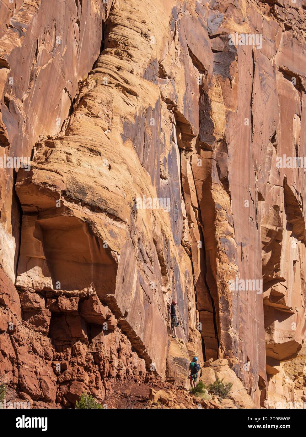 Climbers ascend the lower flanks of Independence Monument, Monument ...
