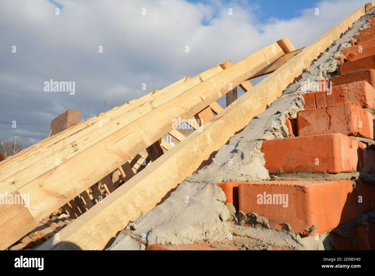 A close-up on a roofing construction, trusses and roof beams ...