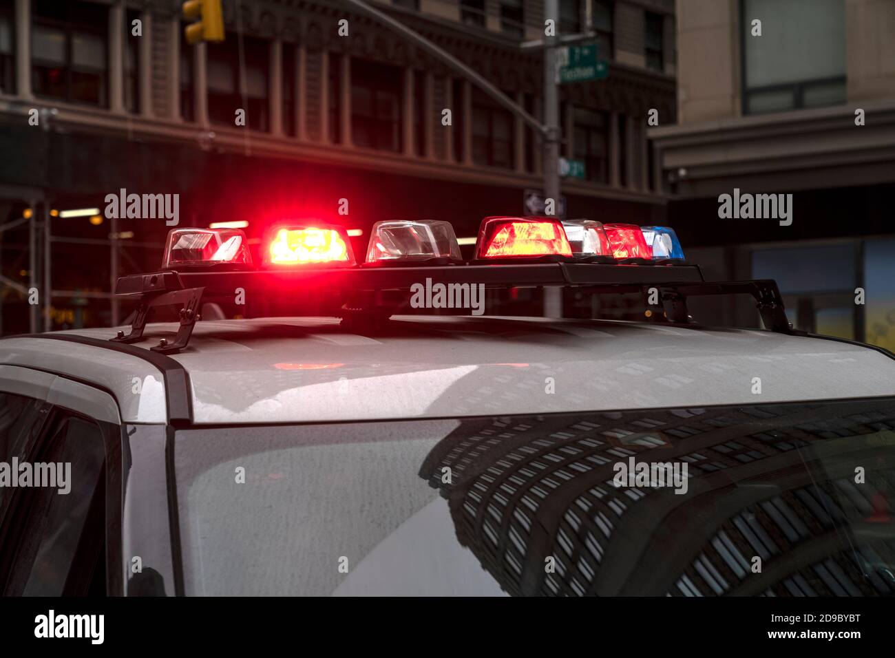 Police emergency lights seen on the street at night Stock Photo - Alamy