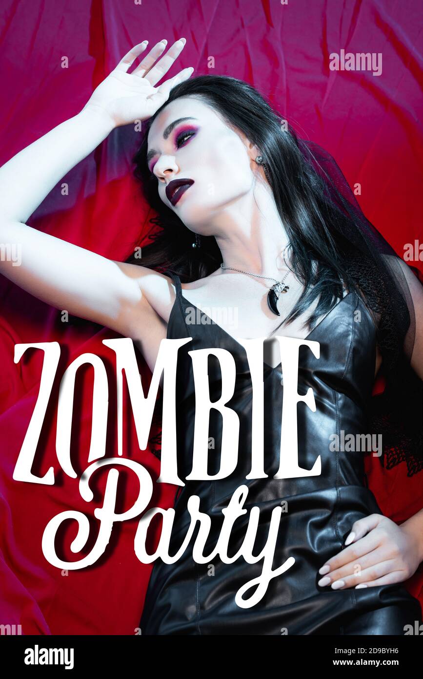 high angle view of brunette and pale woman lying near zombie party ...