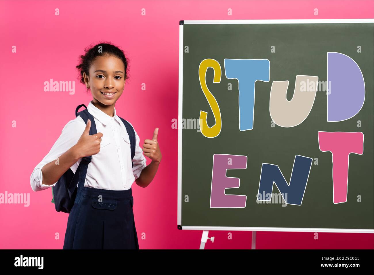 School thumbs up uniform hi-res stock photography and images - Alamy