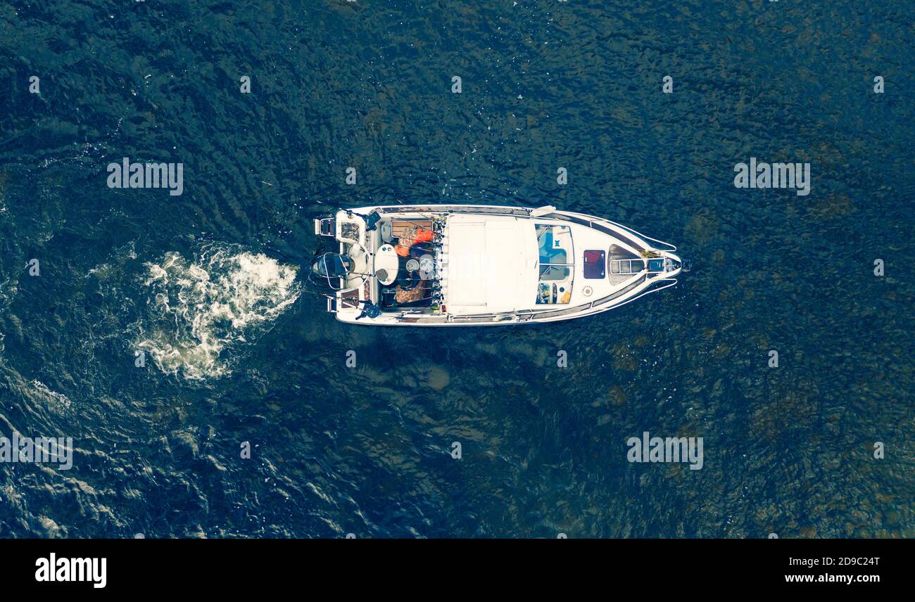 Aerial view fisherman on boat at the ocean. Top view beautiful seascape ...
