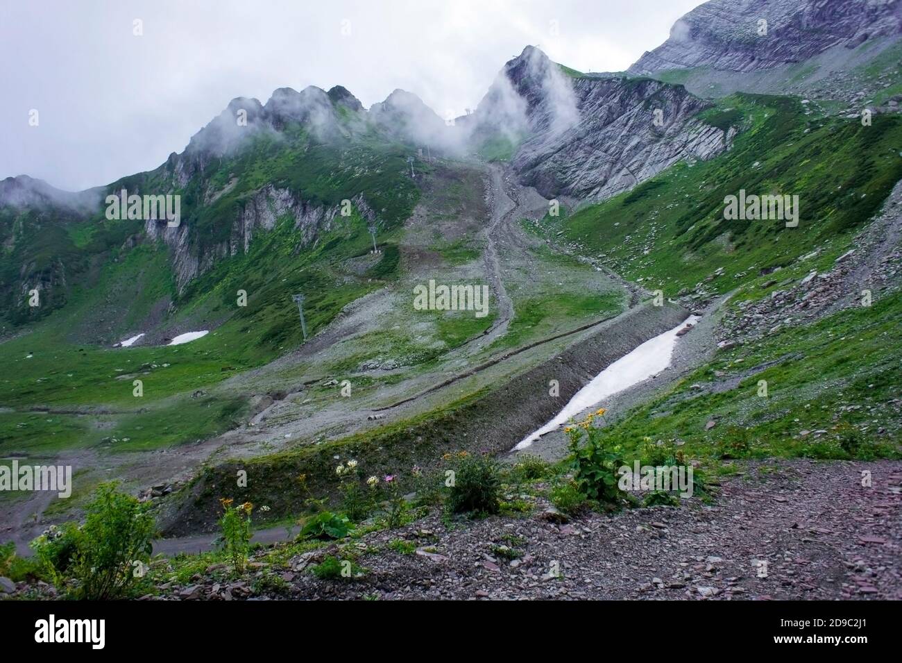 Mountain landscape. Green mountains of the Aibga ridge with small ...