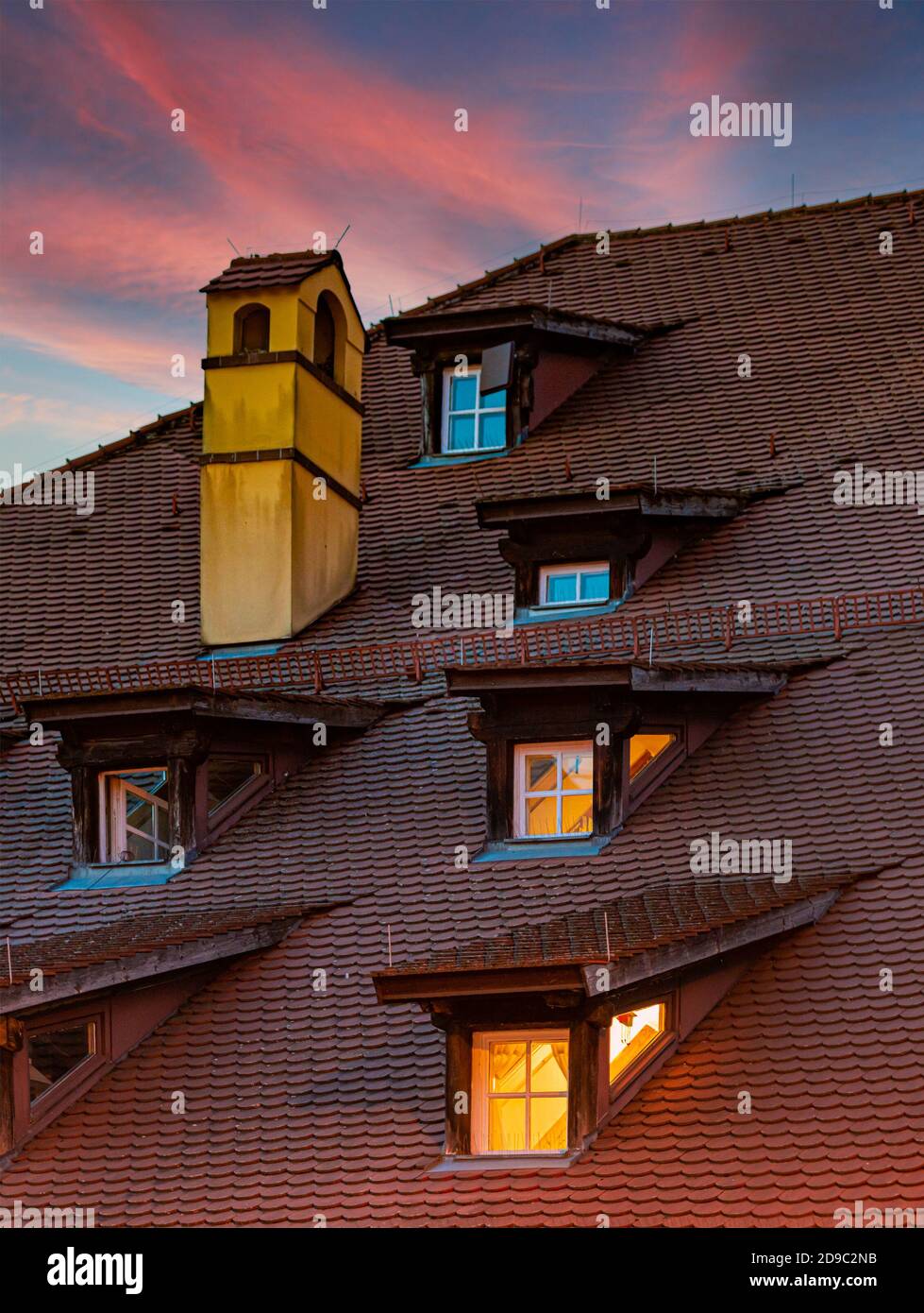 Old house roof with tiles in germany, europe. Sunset scene with cloudy ...