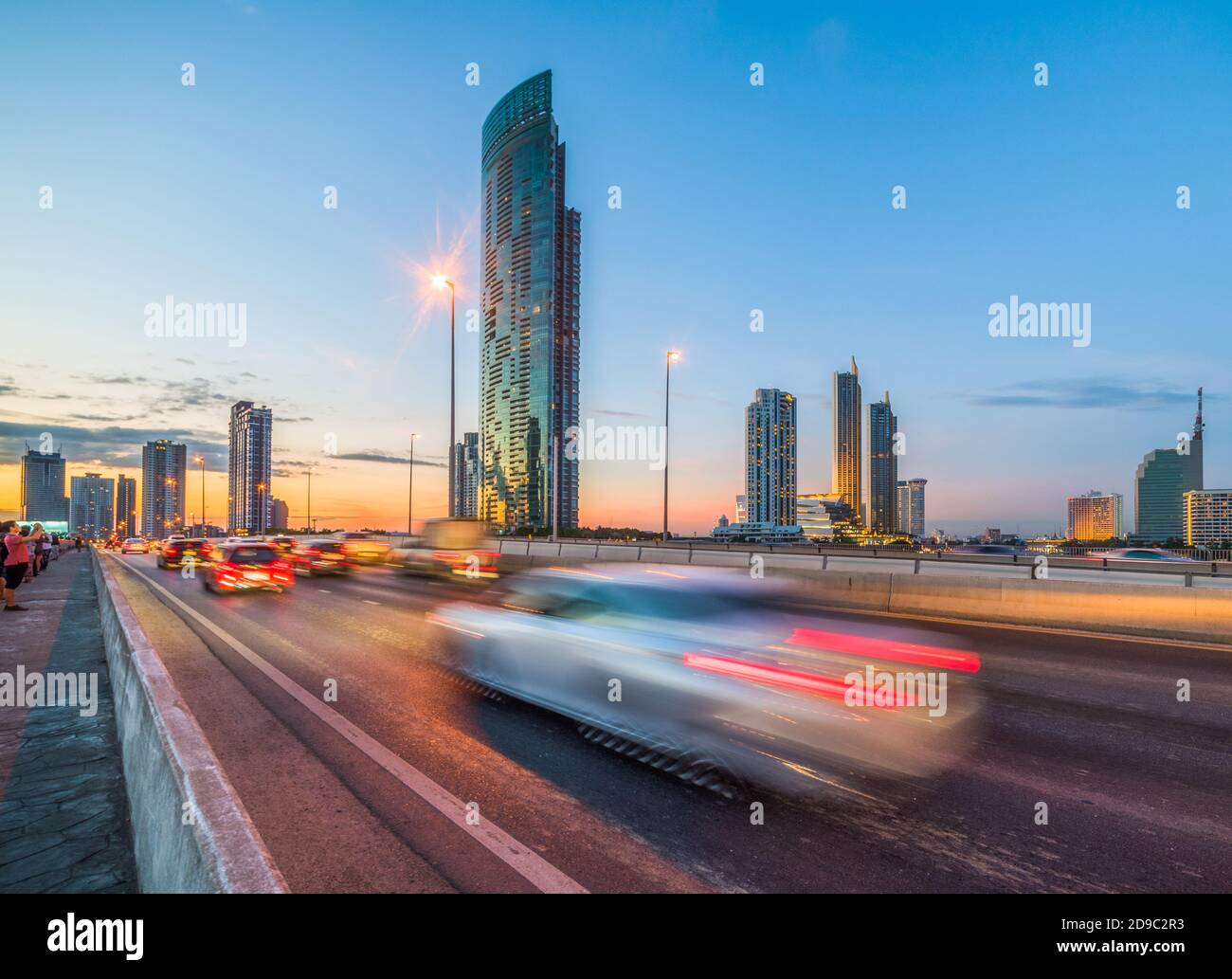 Skyscrapers and Traffic on Taksin Bridge in Bangkok, Thailand at ...