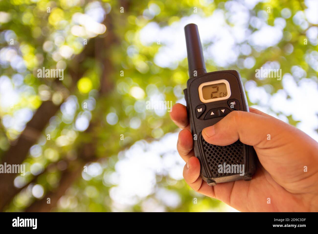 Hand holding walkie talkie radio hi-res stock photography and images ...