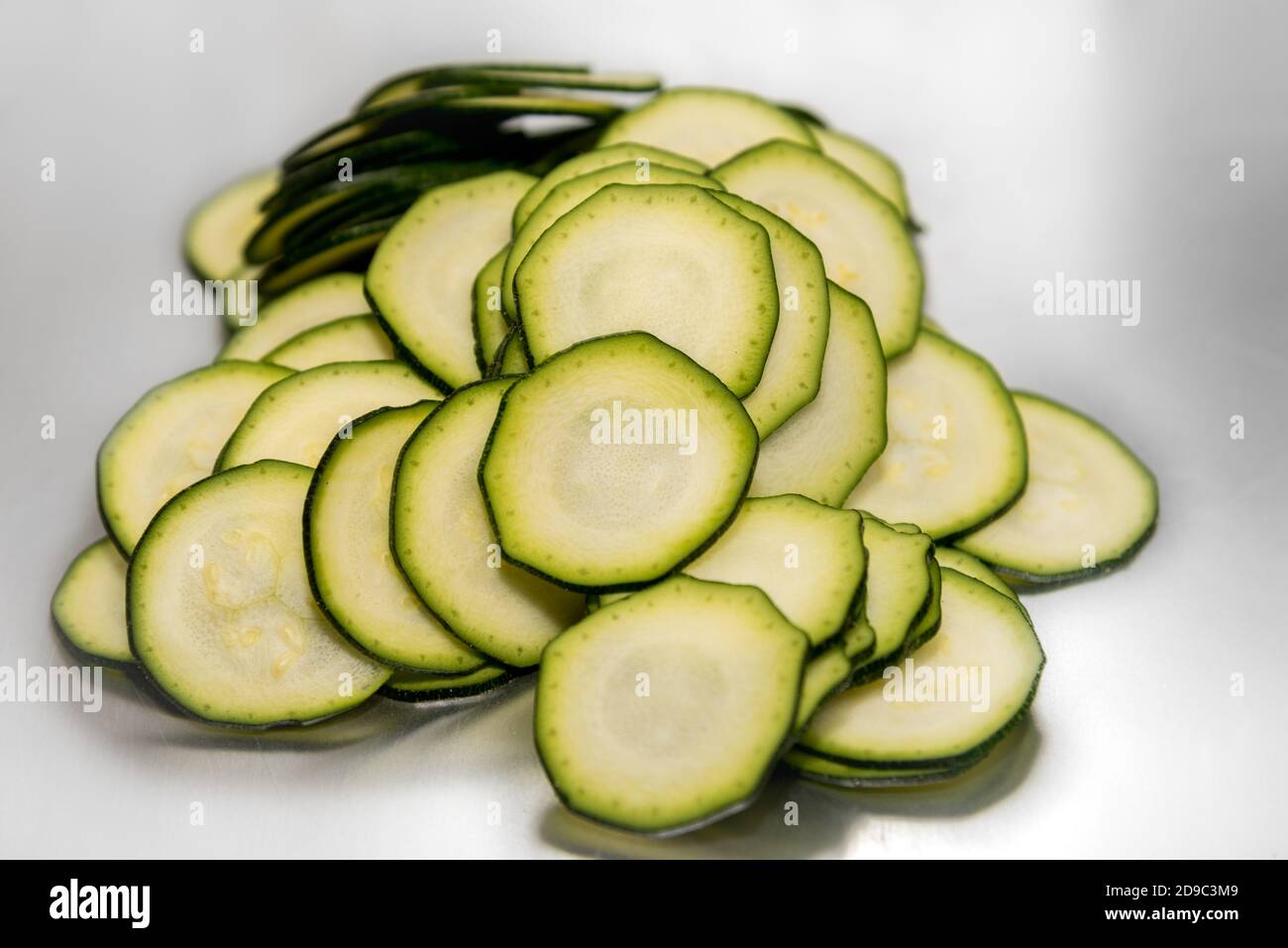 courgette,zucchini sliced in very thin rounds.selective focus Stock ...