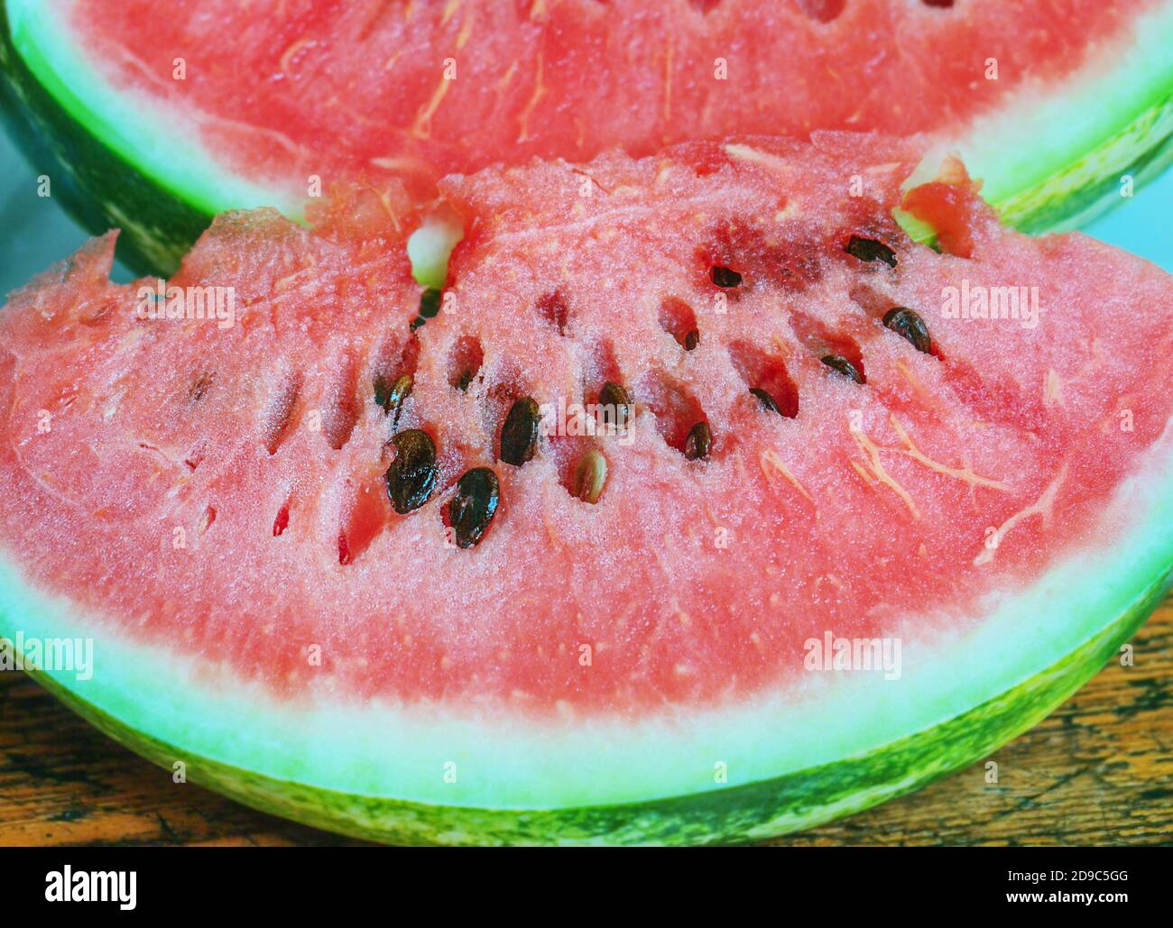 Fresh pretty red slice of ripe watermelon Stock Photo - Alamy