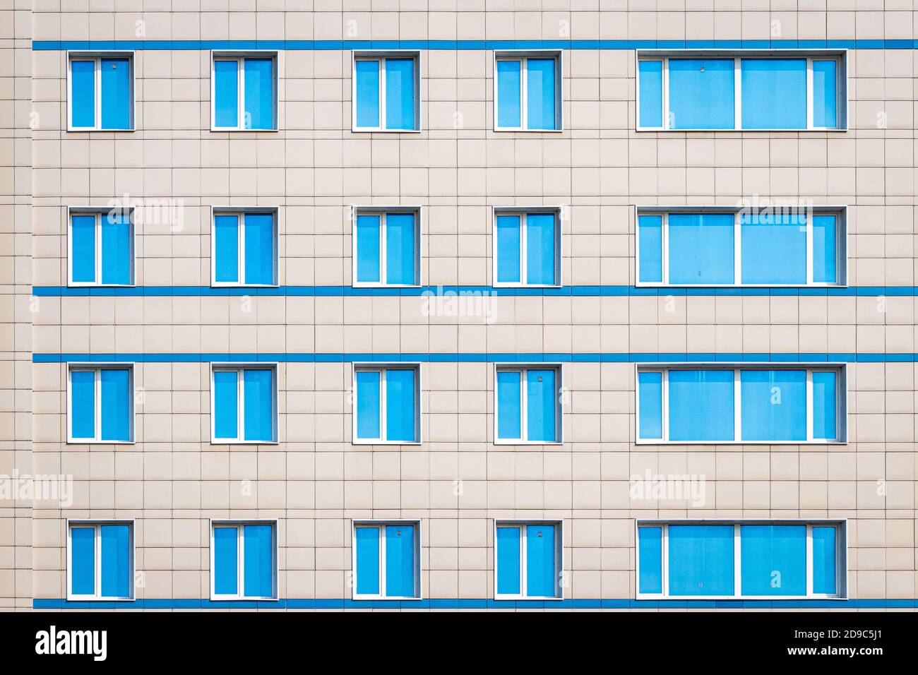 Fragment of an office building with blue mirrored windows Stock Photo ...