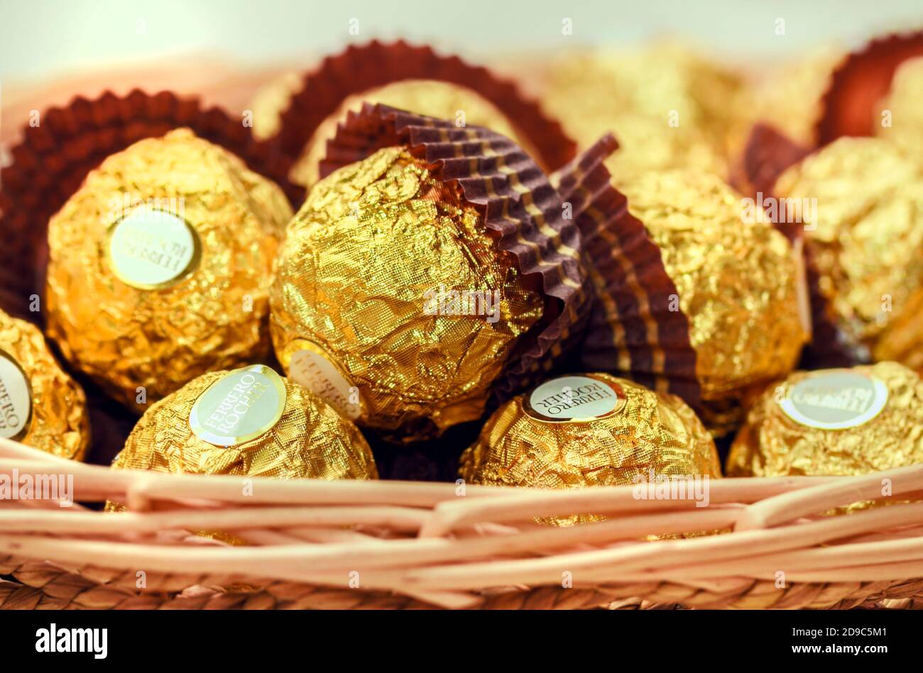Pretty Ferrero Rocher candy in gold cover for editorial use Stock Photo ...