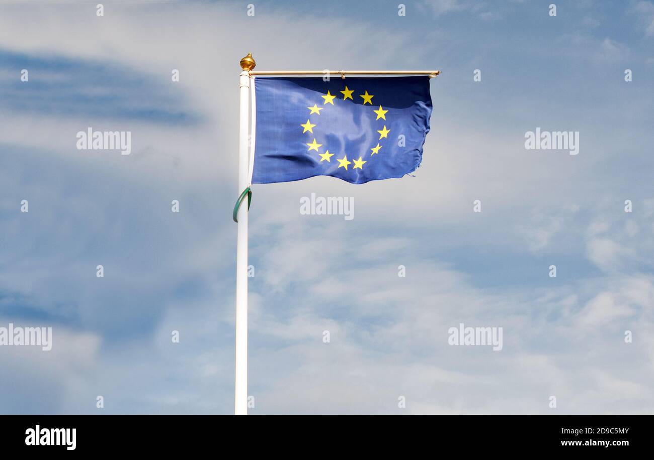 European Union flag flying in front of bright blue sky Stock Photo - Alamy