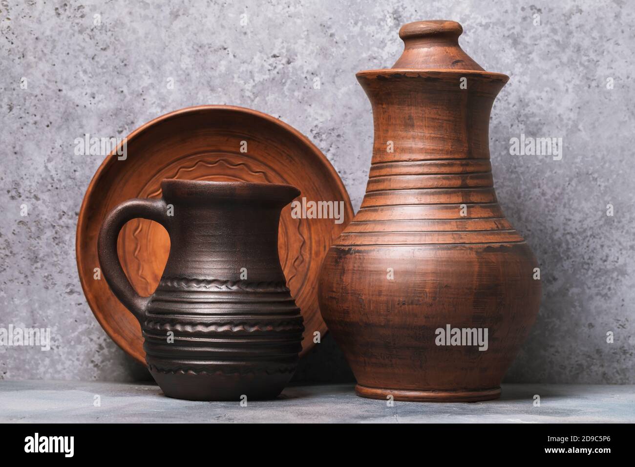Earthenware on the table close up Stock Photo - Alamy