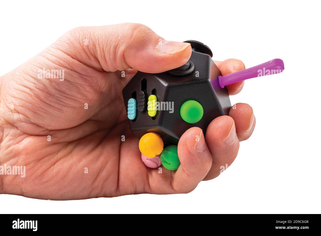 Close up view of colorful anti stress toy in man's hand. Stress and ...