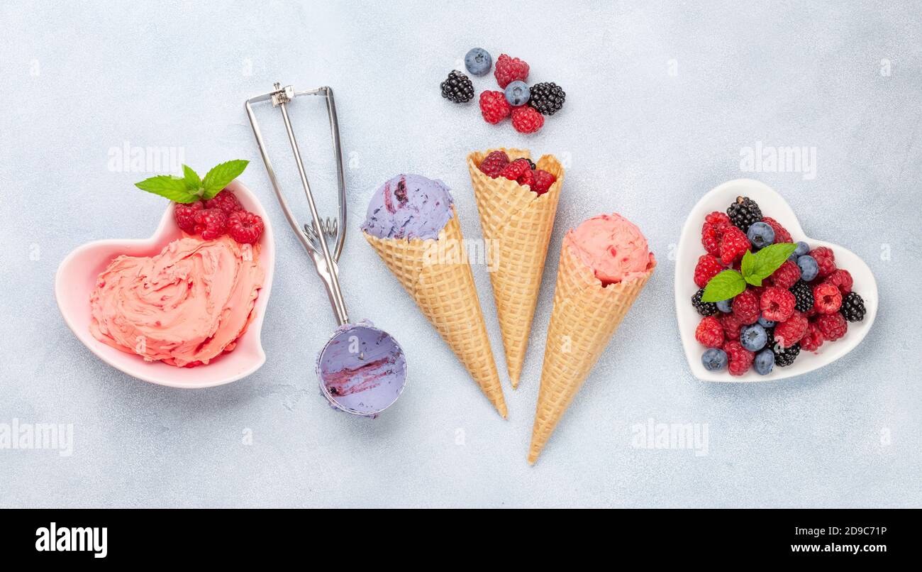 Berry and vanilla ice cream sundae. Top view flat lay Stock Photo - Alamy