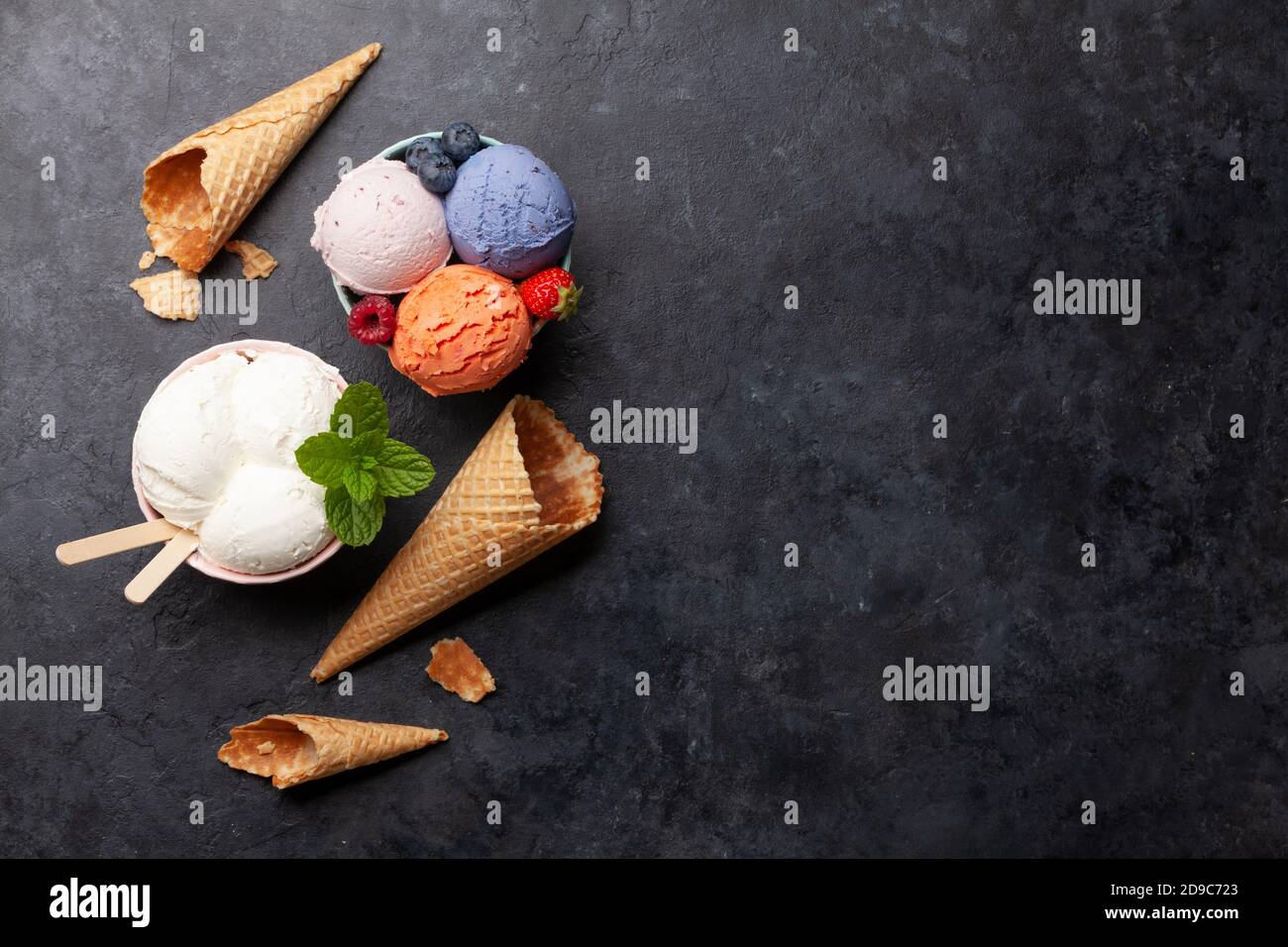 Berry and vanilla ice cream sundae. Top view flat lay with copy space ...