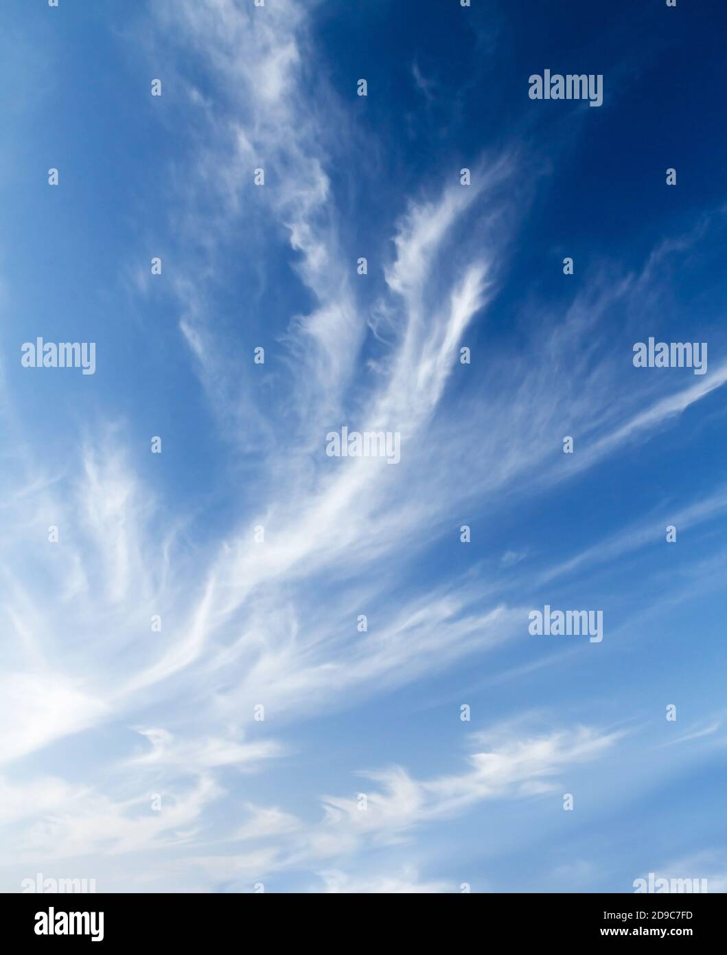 Blue sky with light clouds backdrop texture Stock Photo - Alamy