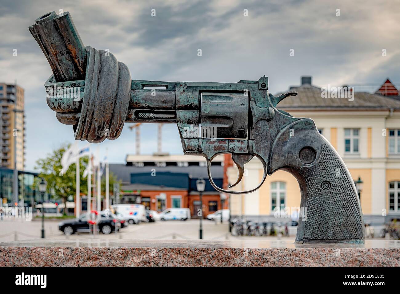 MALMO, SWEDEN - AUGUST 21, 2020: The Knotted Gun, is a bronze sculpture ...