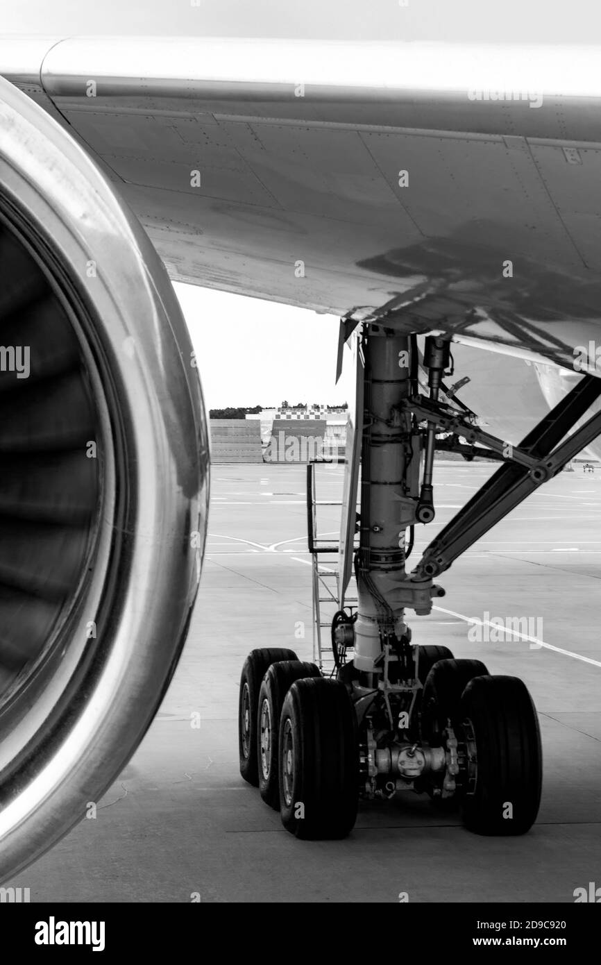 Airplane parked at airport. aircraft engine and chassis. Close up Stock ...