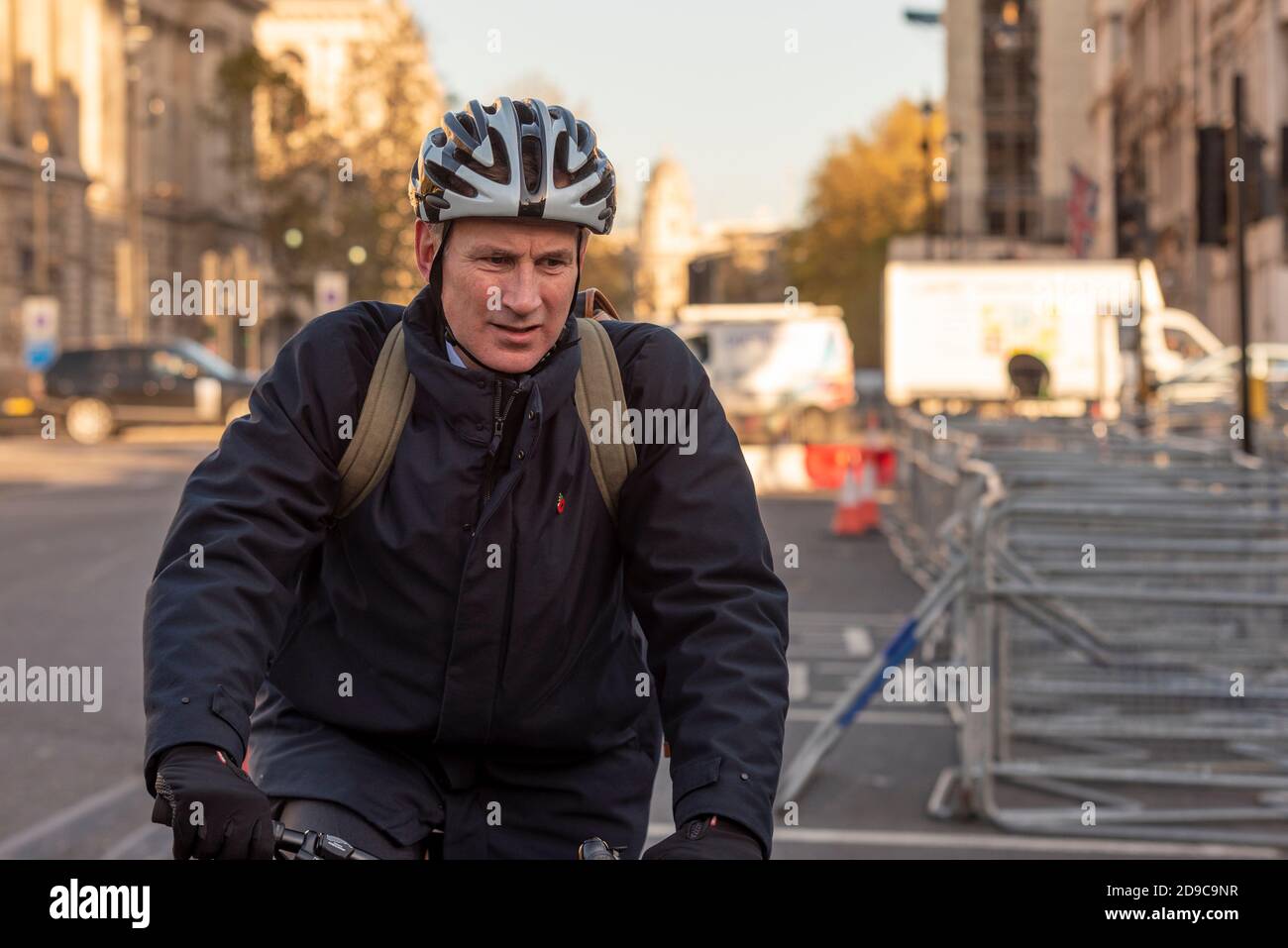 Jeremy Hunt MP arriving at Parliament on a bicycle on the day of the ...
