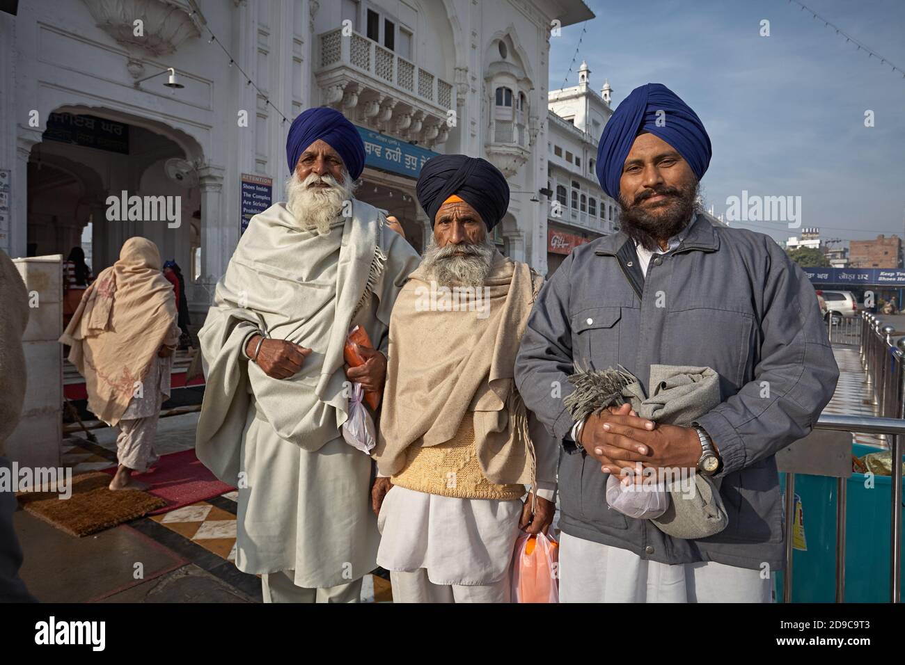 Amritsar, Punjab, India, August 2012. A group of Sikh men in the Golden ...