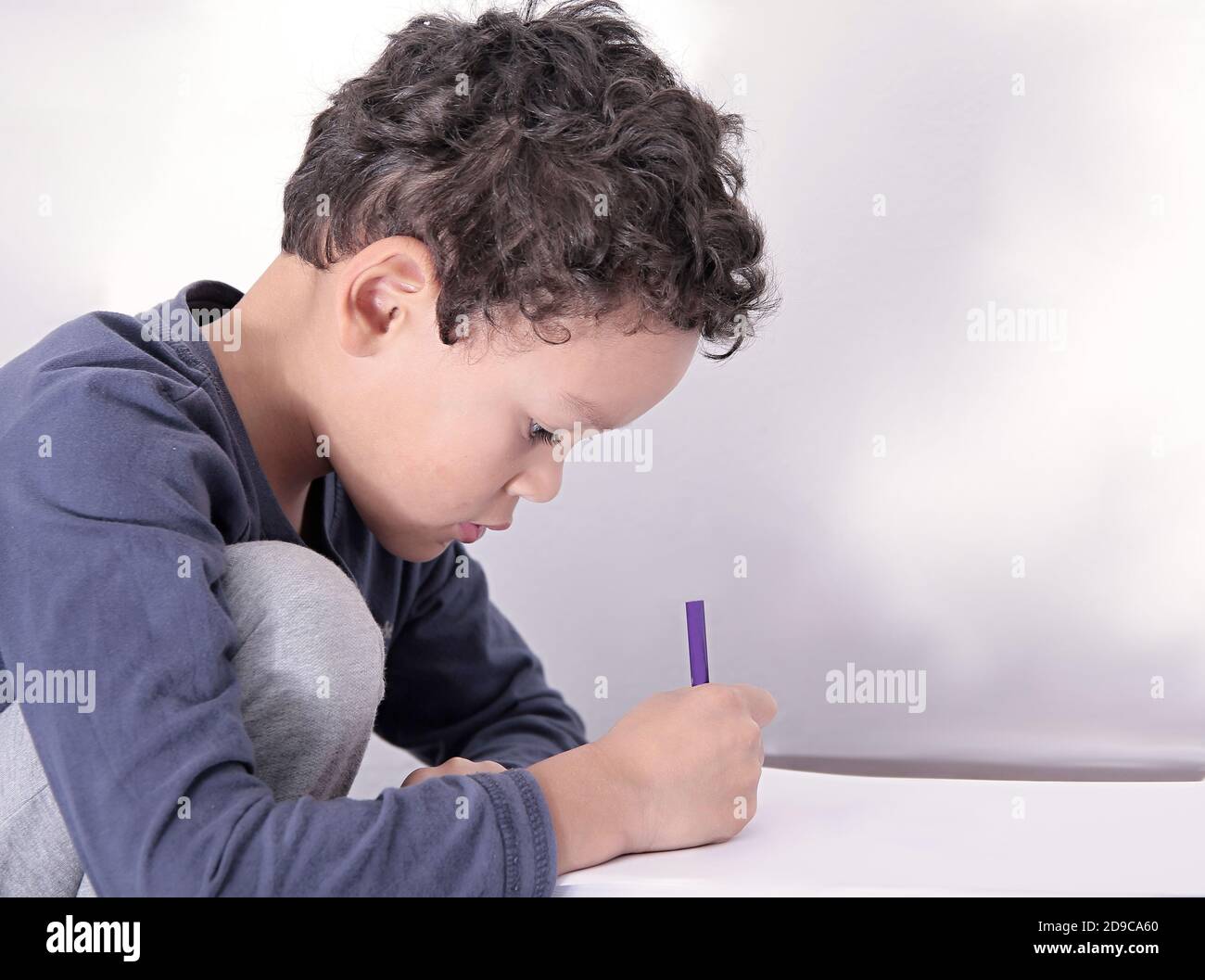 little boy learning at school on white background stock photo Stock ...