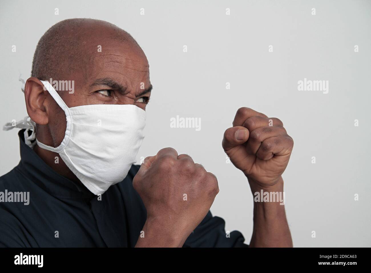 Men with masks hi-res stock photography and images - Alamy