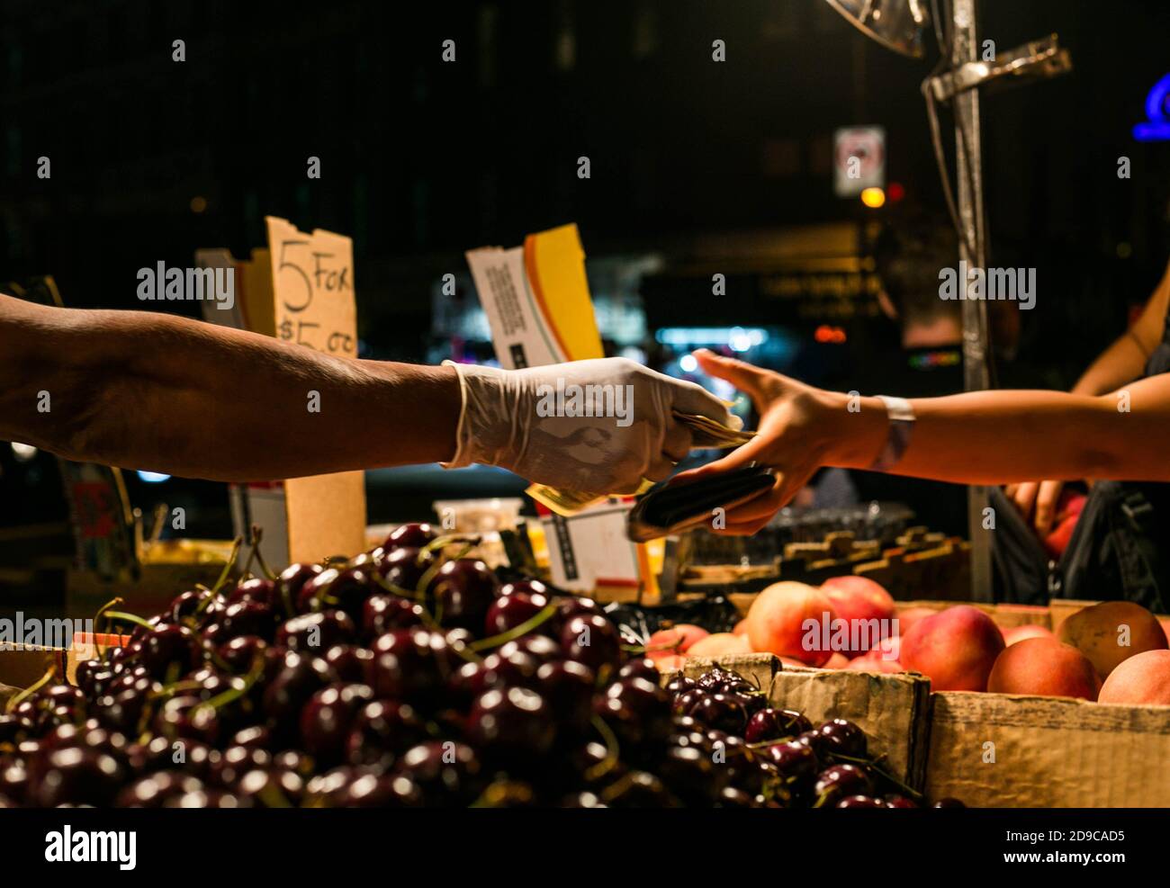 A person paying money for food purchased. New York, USA Stock Photo - Alamy