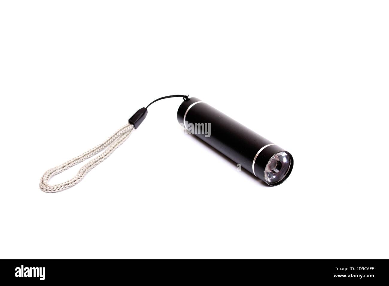 Black flashlight isolated on a white background Stock Photo - Alamy