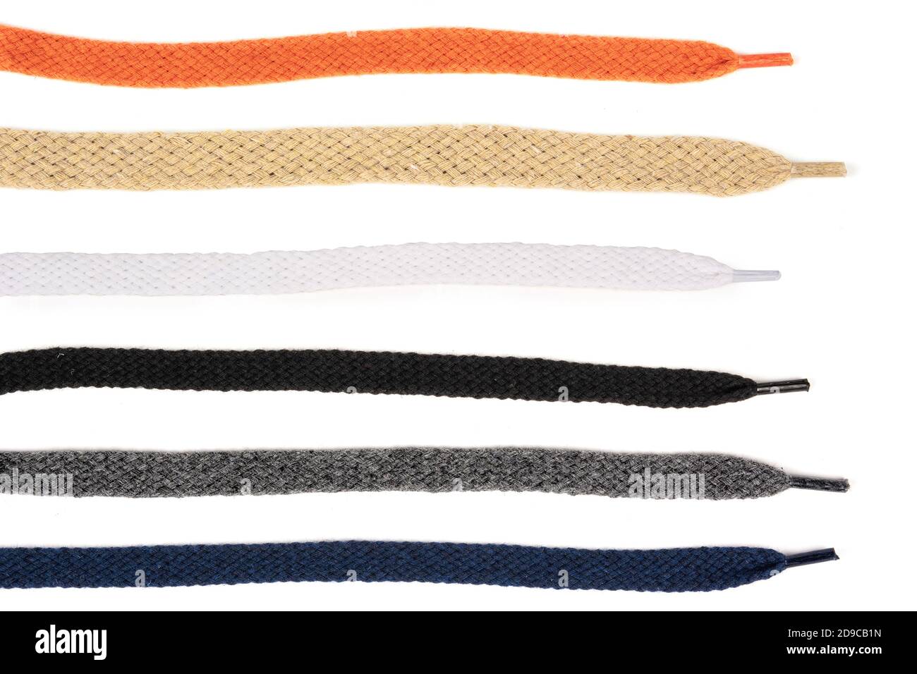 Collection of colored cotton laces for shoes with tip on white ...