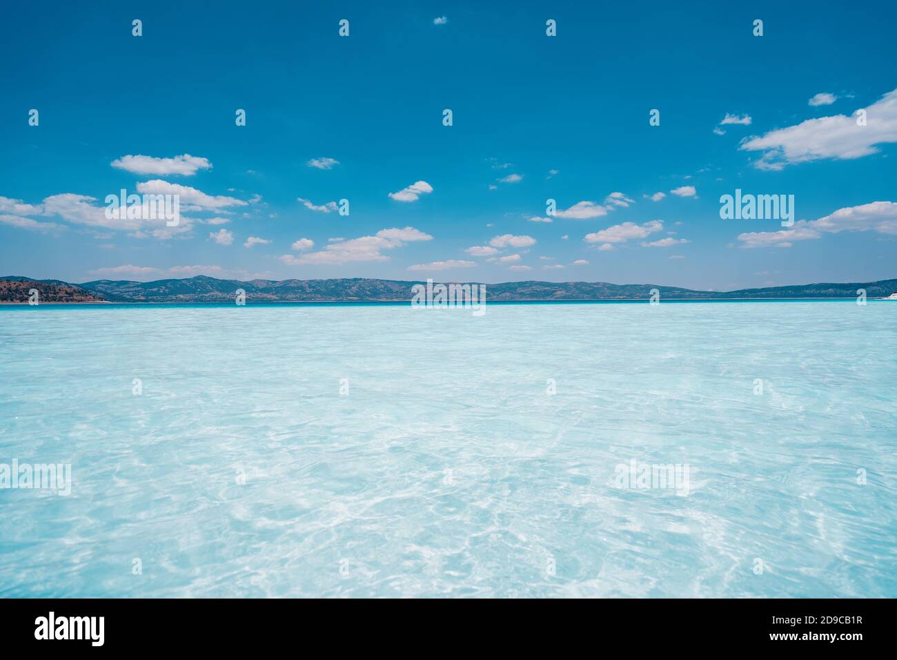 Summer sunny day, blue sky, white clouds and water sea background. Blue ...