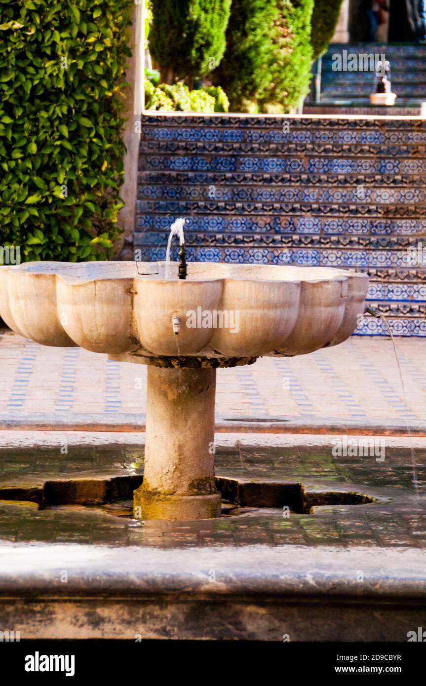 Islamic style water fountains and Spanish style tiles in the Andalusian ...