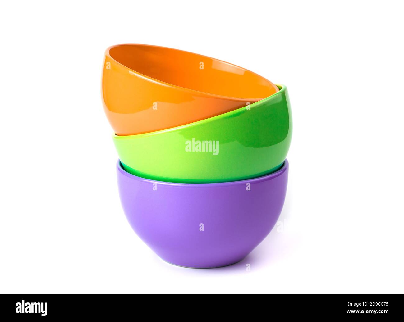 Deep bowls of bright colors on a white background Stock Photo - Alamy
