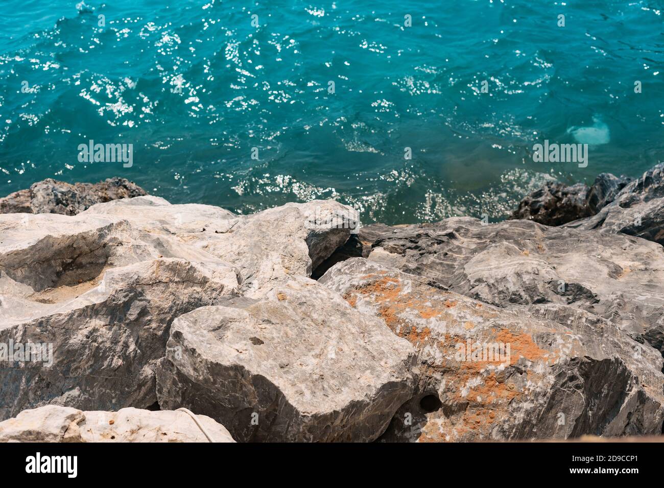 Fantastic rocky shore of the sea, stone coast, natural sea background ...