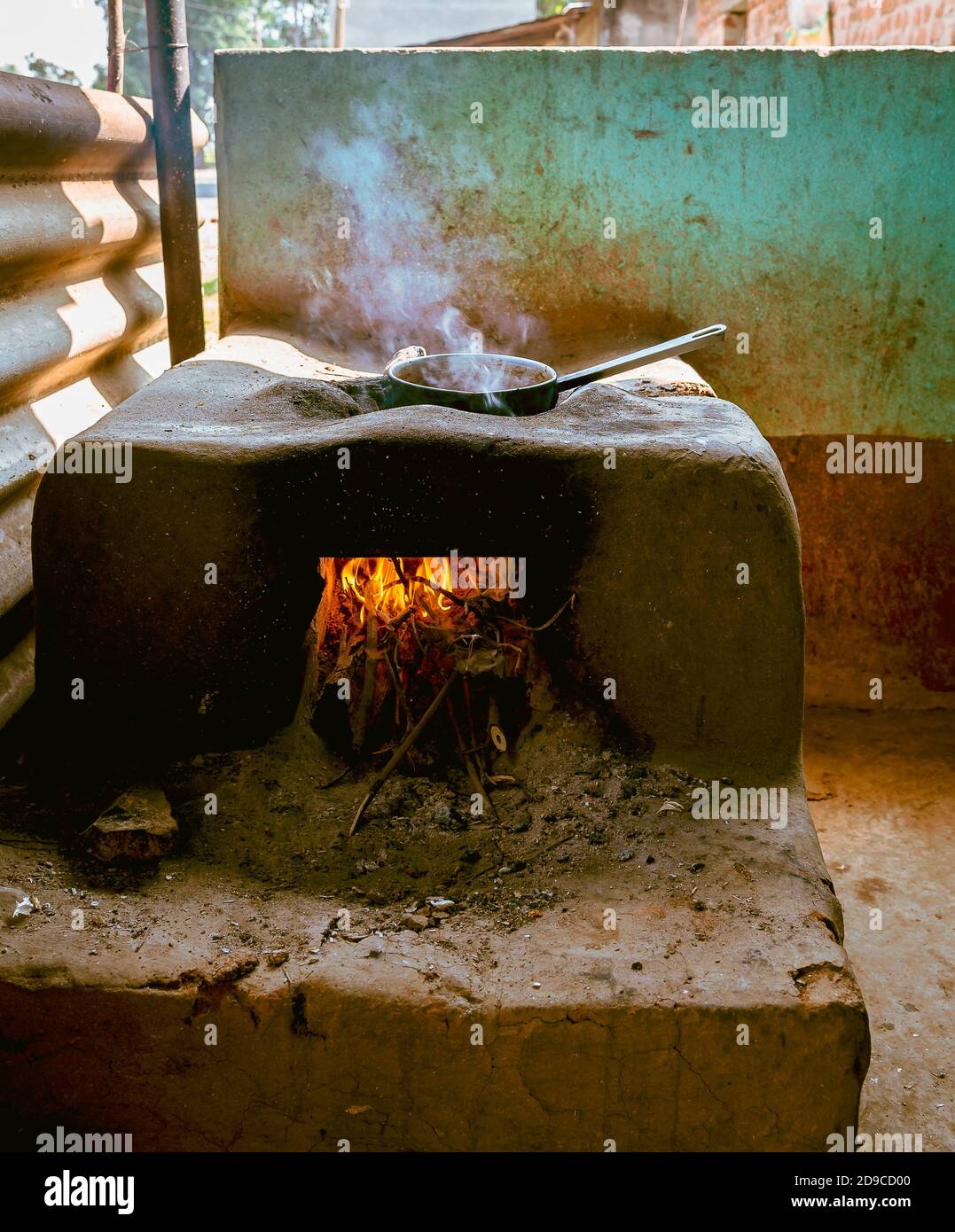 Hand of A Street Hawker preparing Tea on a Clay Oven Stock Photo - Alamy