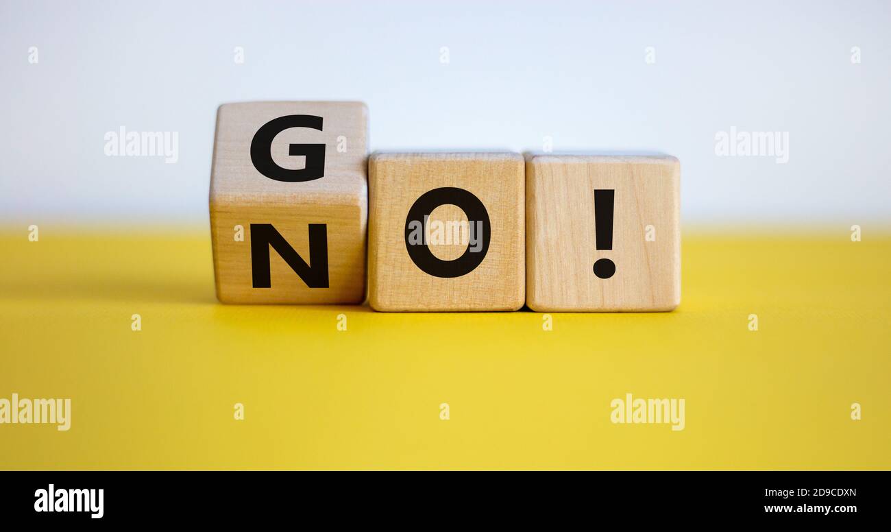 Hand turns wood blocks and changes the word 'no' to 'go'. Beautiful ...