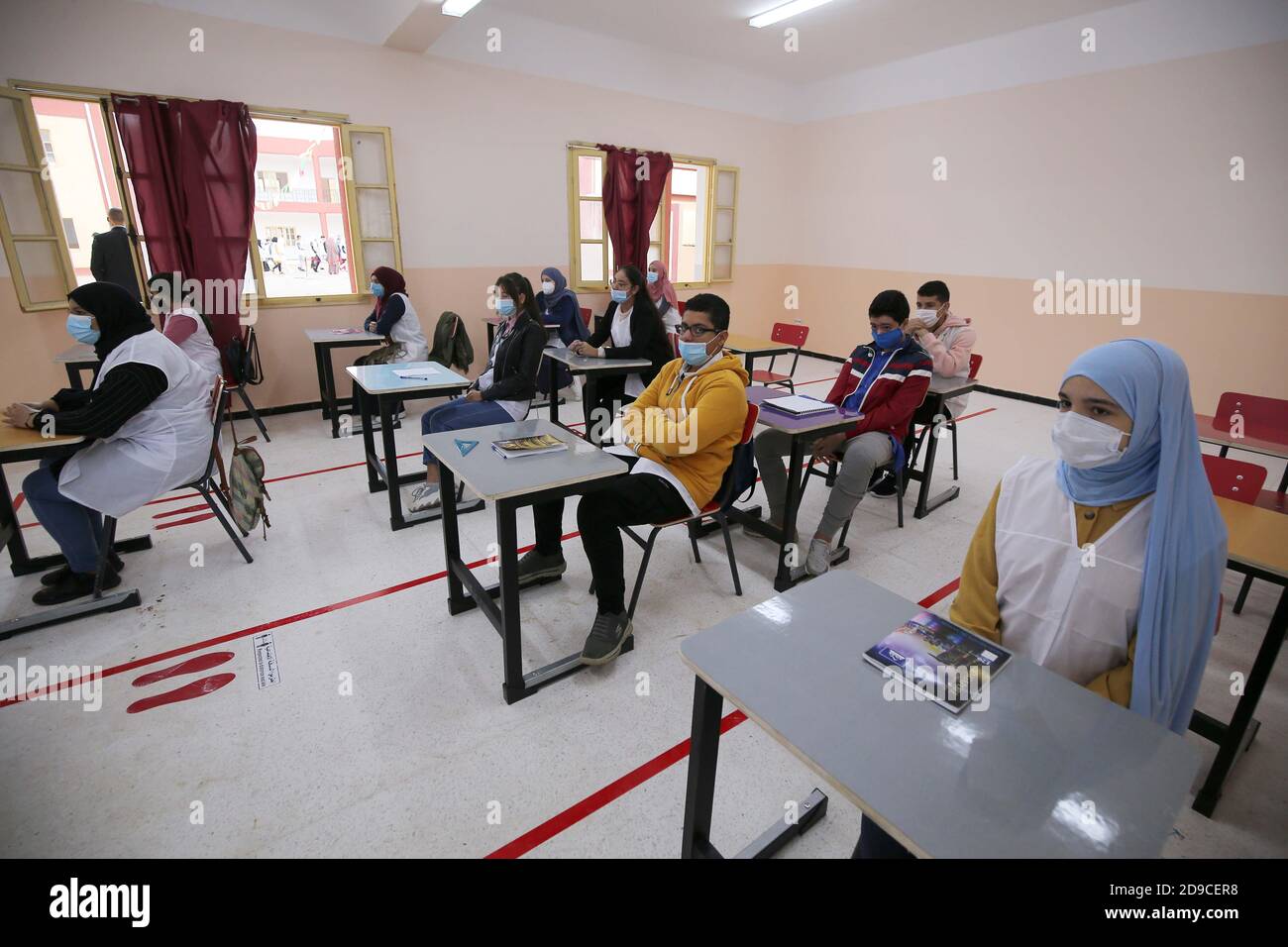 Algiers. 4th Nov, 2020. Algerian students attend a class at a school in ...
