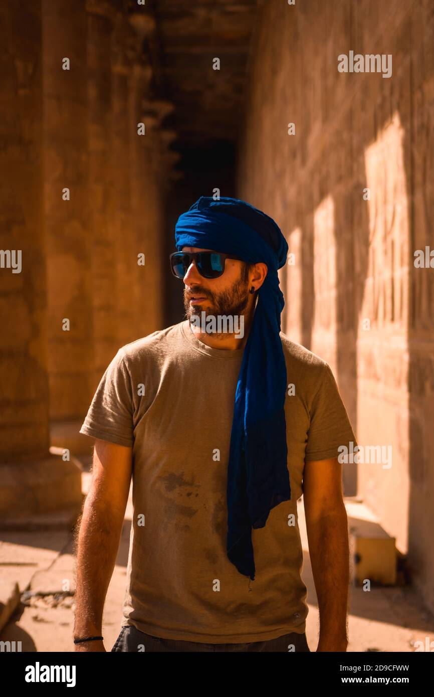 Shallow focus of a male wearing a blue Turban and posing at The Temple ...