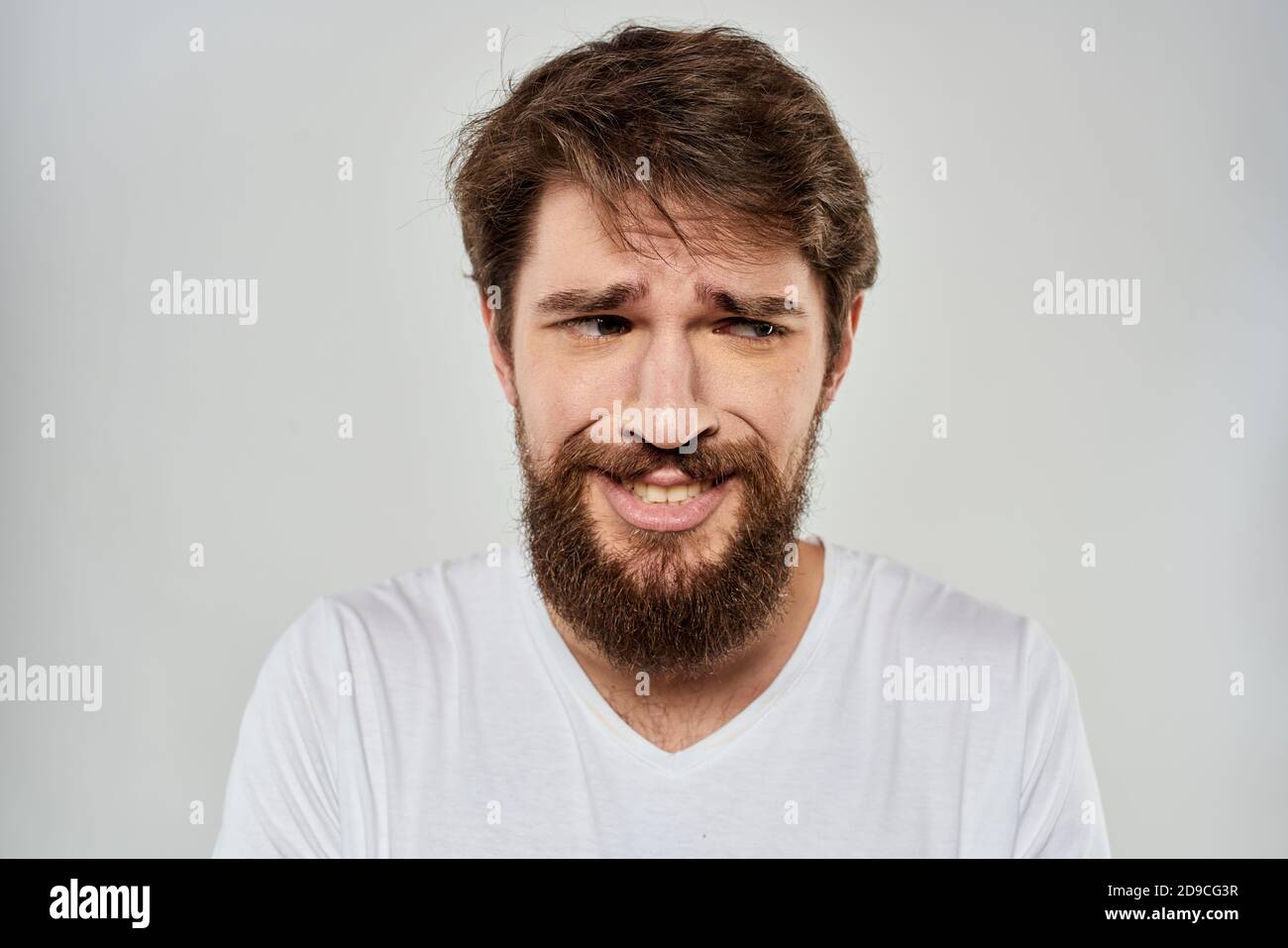 emotional bearded man close-up facial expression studio lifestyle Stock ...